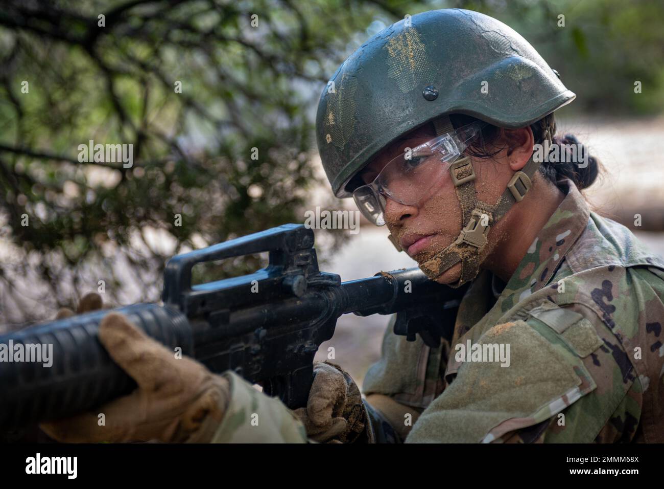 Security Forces trainees at the 343rd Training Squadron move through a ...