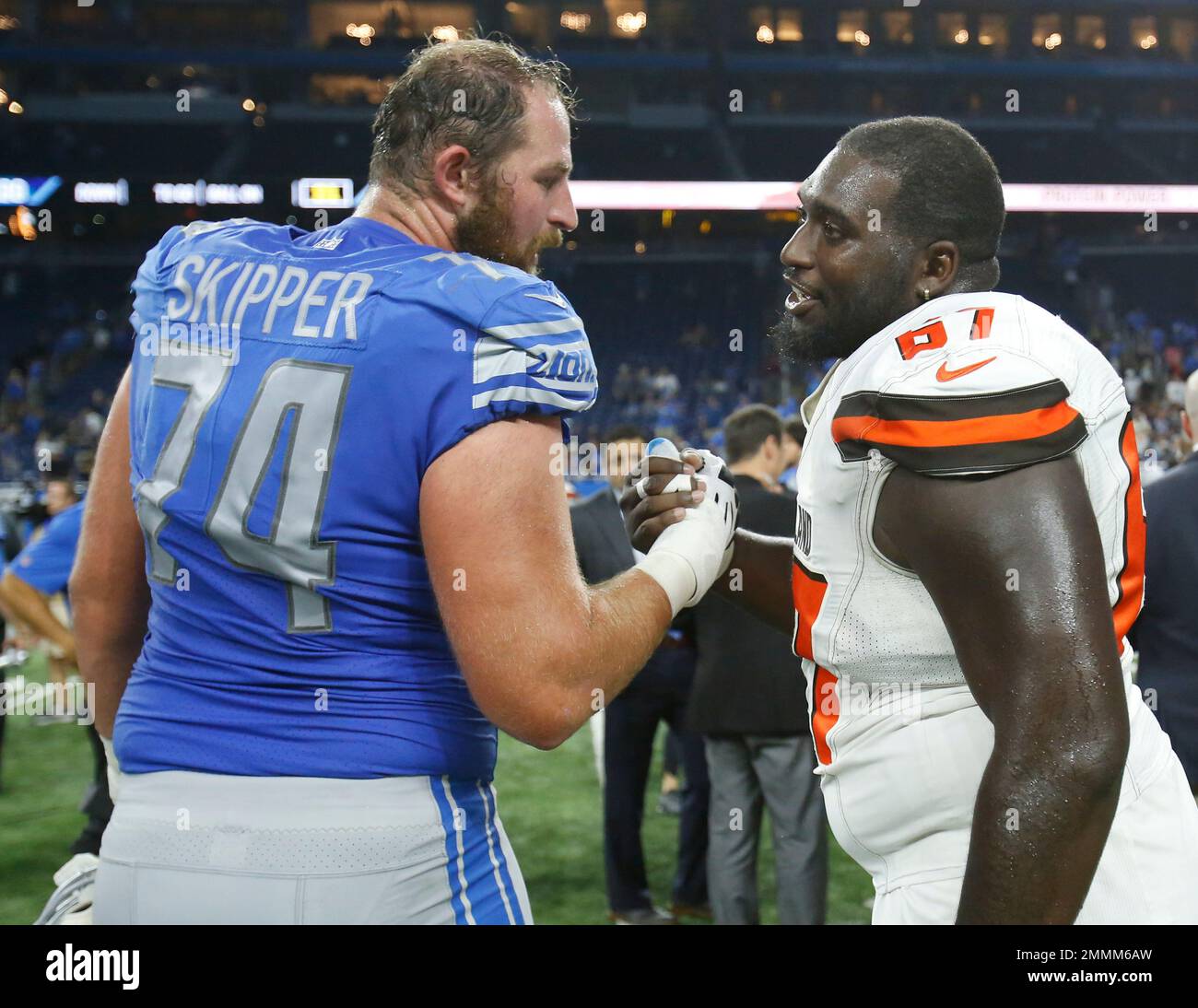 Detroit Lions offensive tackle Dan Skipper (74) talks with Cleveland ...