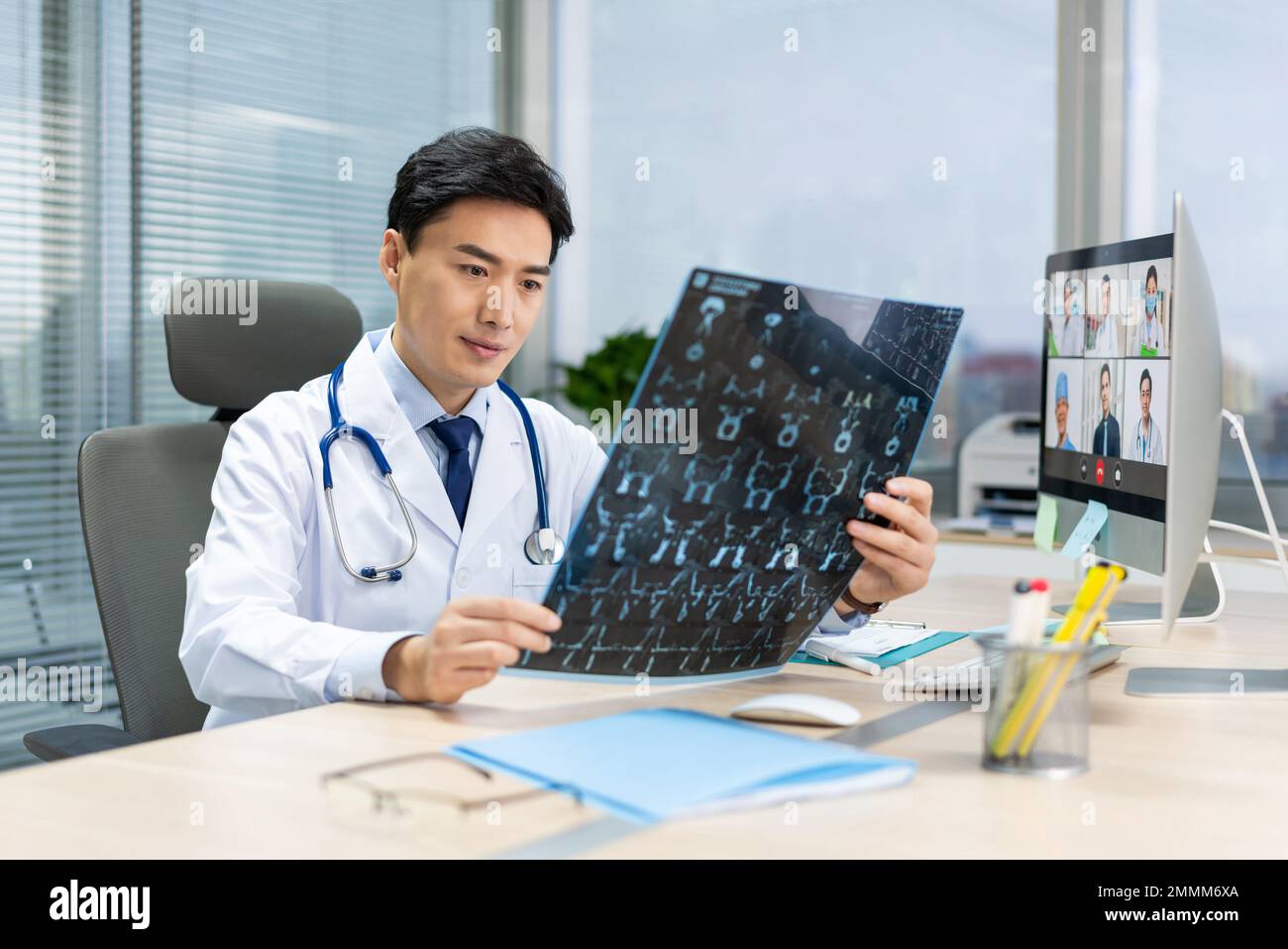 The young doctor to see x-rays Stock Photo - Alamy