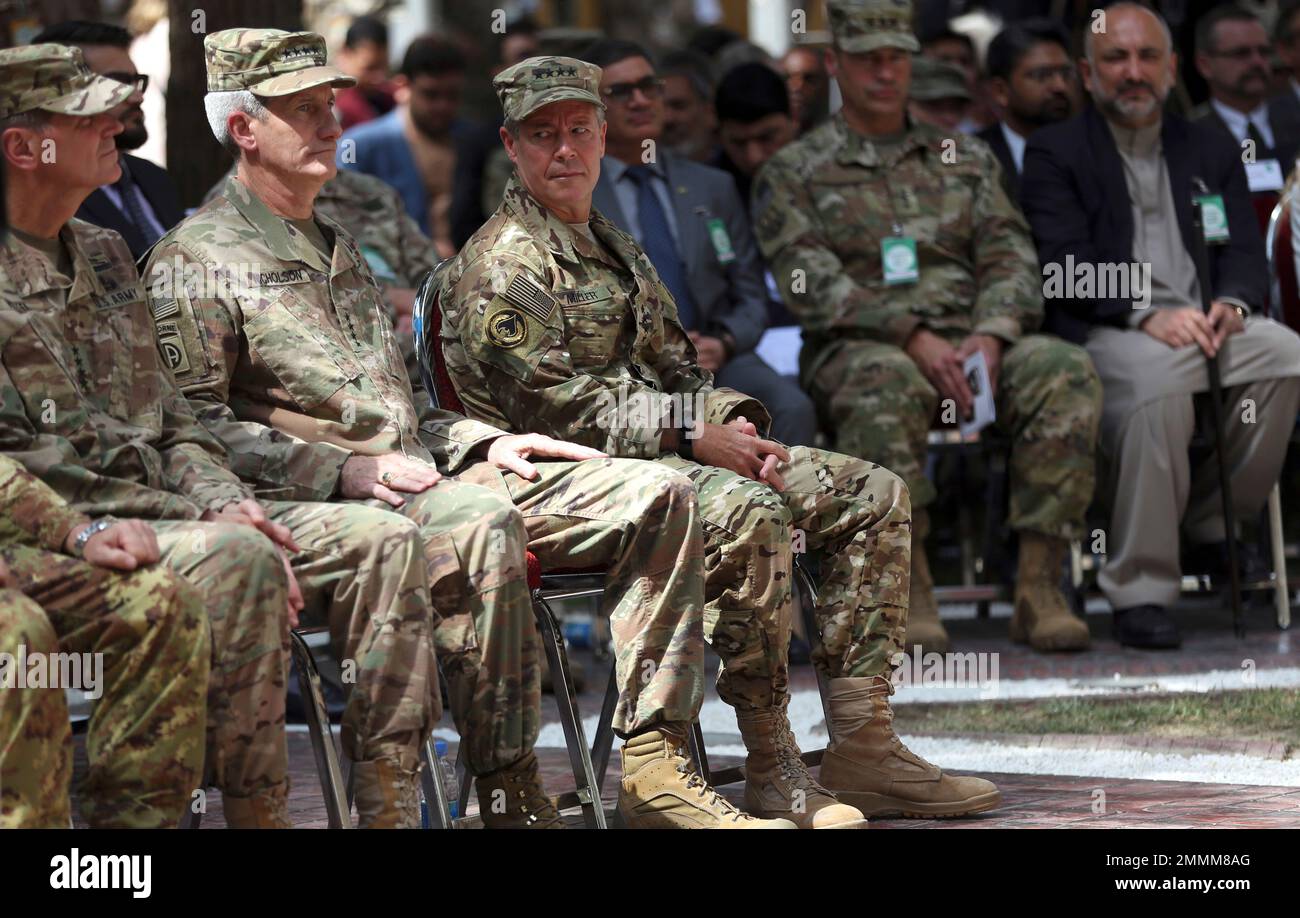Outgoing U.S. Army Gen. John Nicholson, second from left, listens as ...