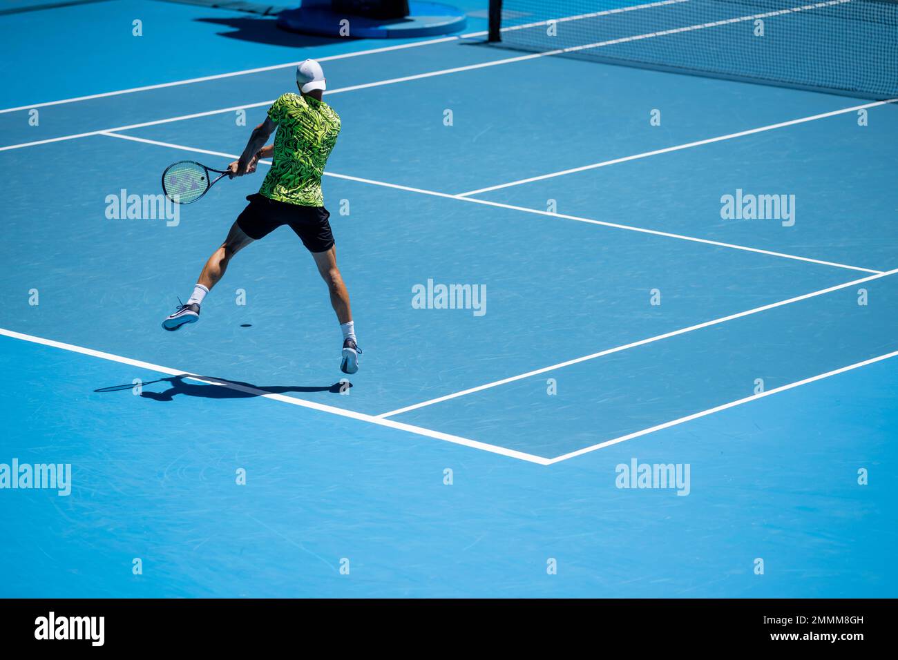 Professional athlete Tennis player playing on a court in a tennis ...