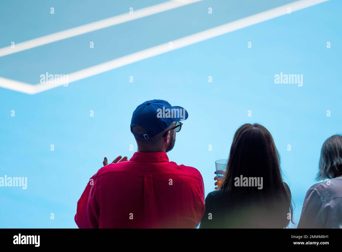 fans watching a sporting match and sporting event in a stadium in ...