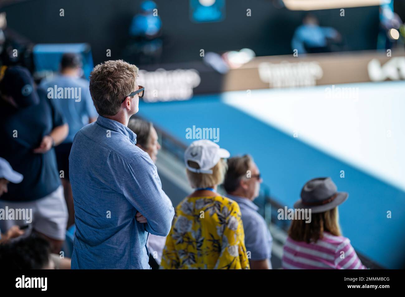 fans watching a sporting match and sporting event in a stadium in ...