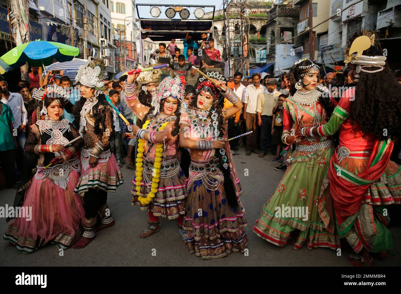 Indian girls dressed as Hindu god Krishna and his consort Radha, dance ...