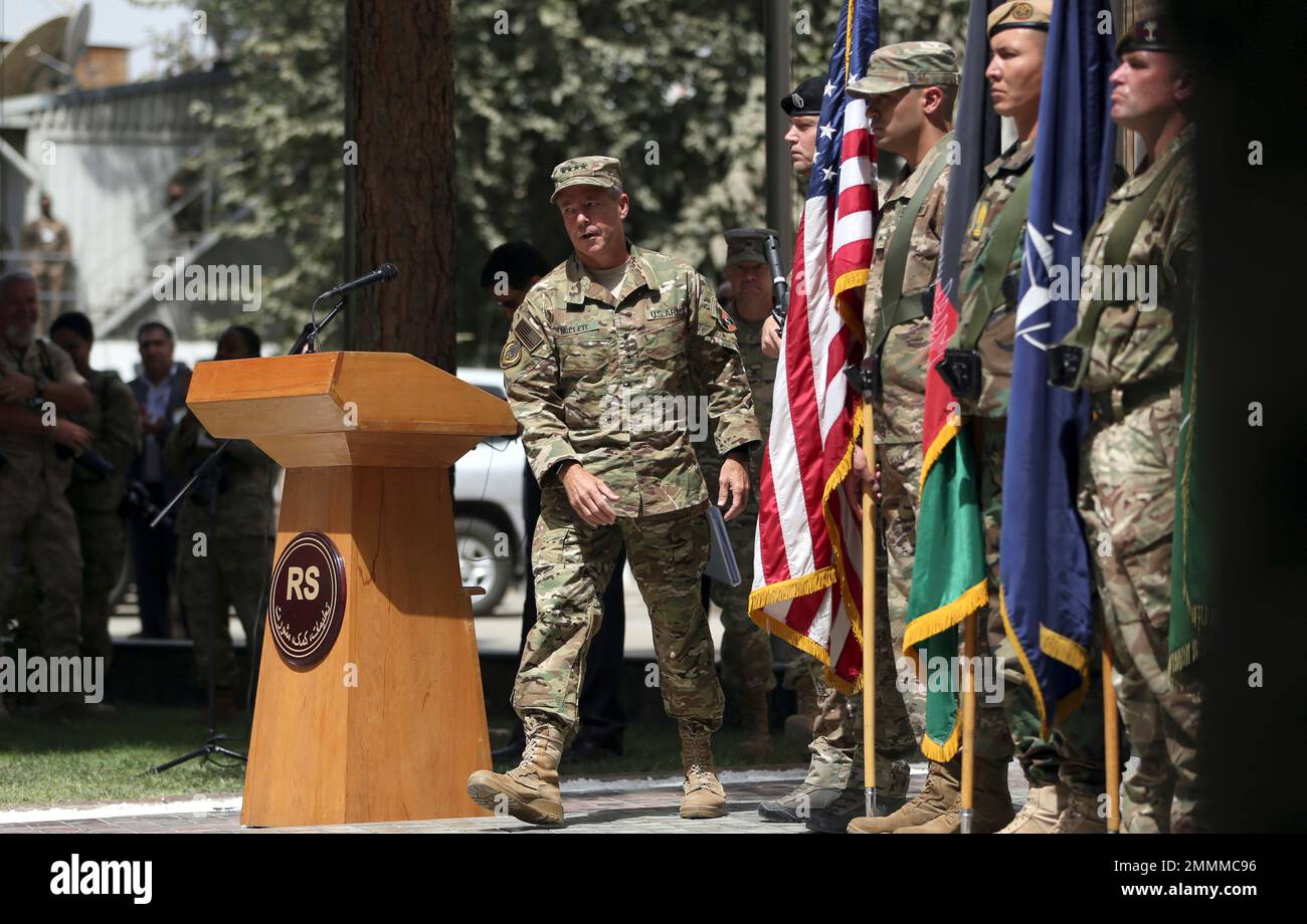 U.S. Army Gen. Austin Miller walks back to his chair after his speech ...