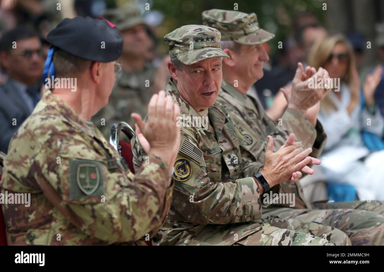 Incoming U.S. Army Gen. Austin Miller, second from left, talks to his ...