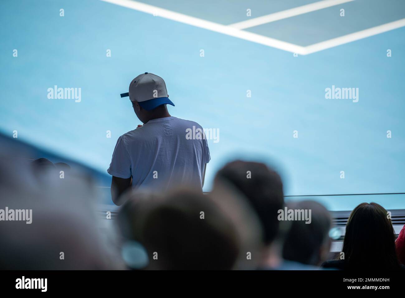 fans watching a sporting match and sporting event in a stadium in ...