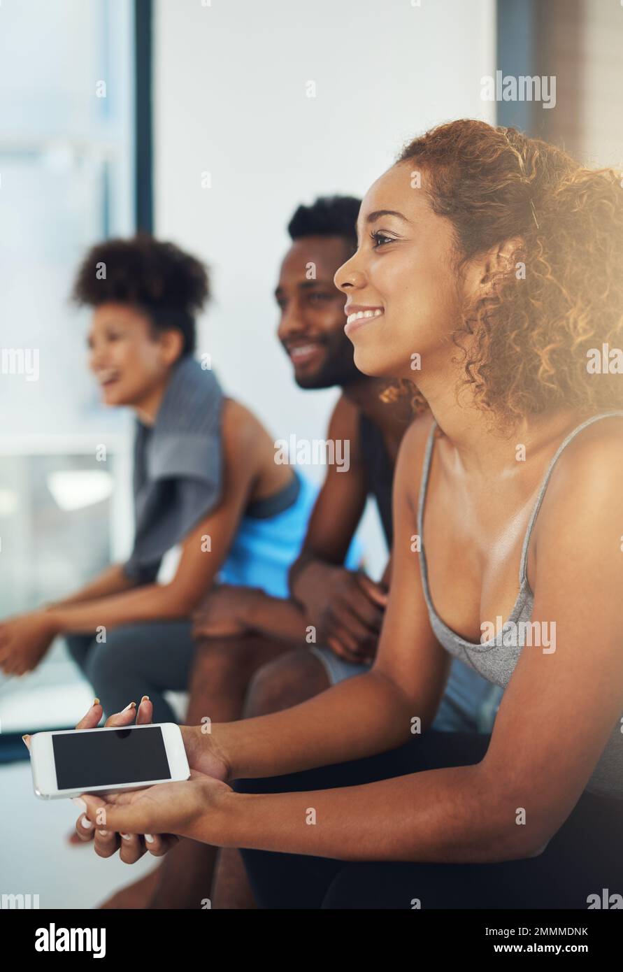 Grab a friend and try a group fitness workout. three young people ...