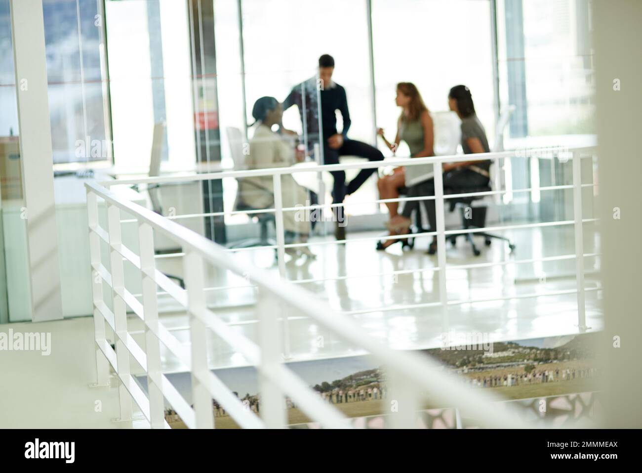Building sound business strategies. a group of colleagues brainstorming ...