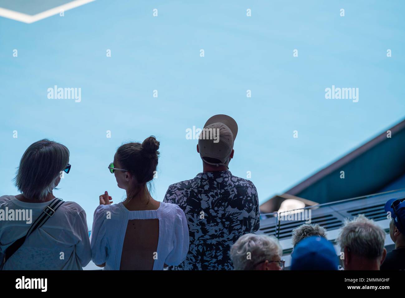 fans watching a sporting match and sporting event in a stadium in ...