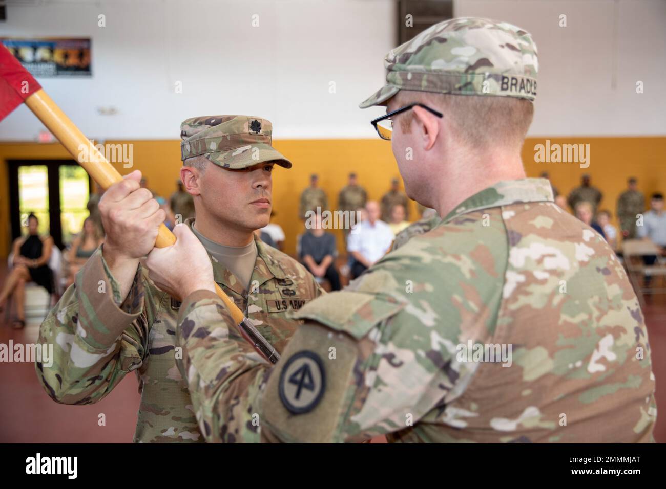 U.S. Army Capt. Clinton Bradley passes the guidon to Lt. Col. David ...