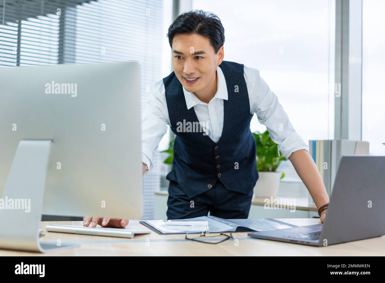 A young business man office Stock Photo - Alamy