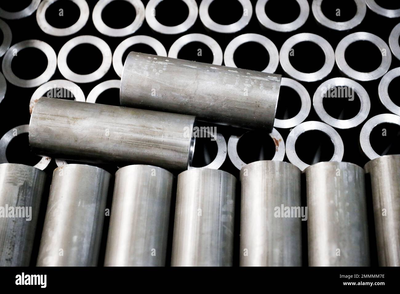 Steel parts and components are organized across a table at the Sheffer ...