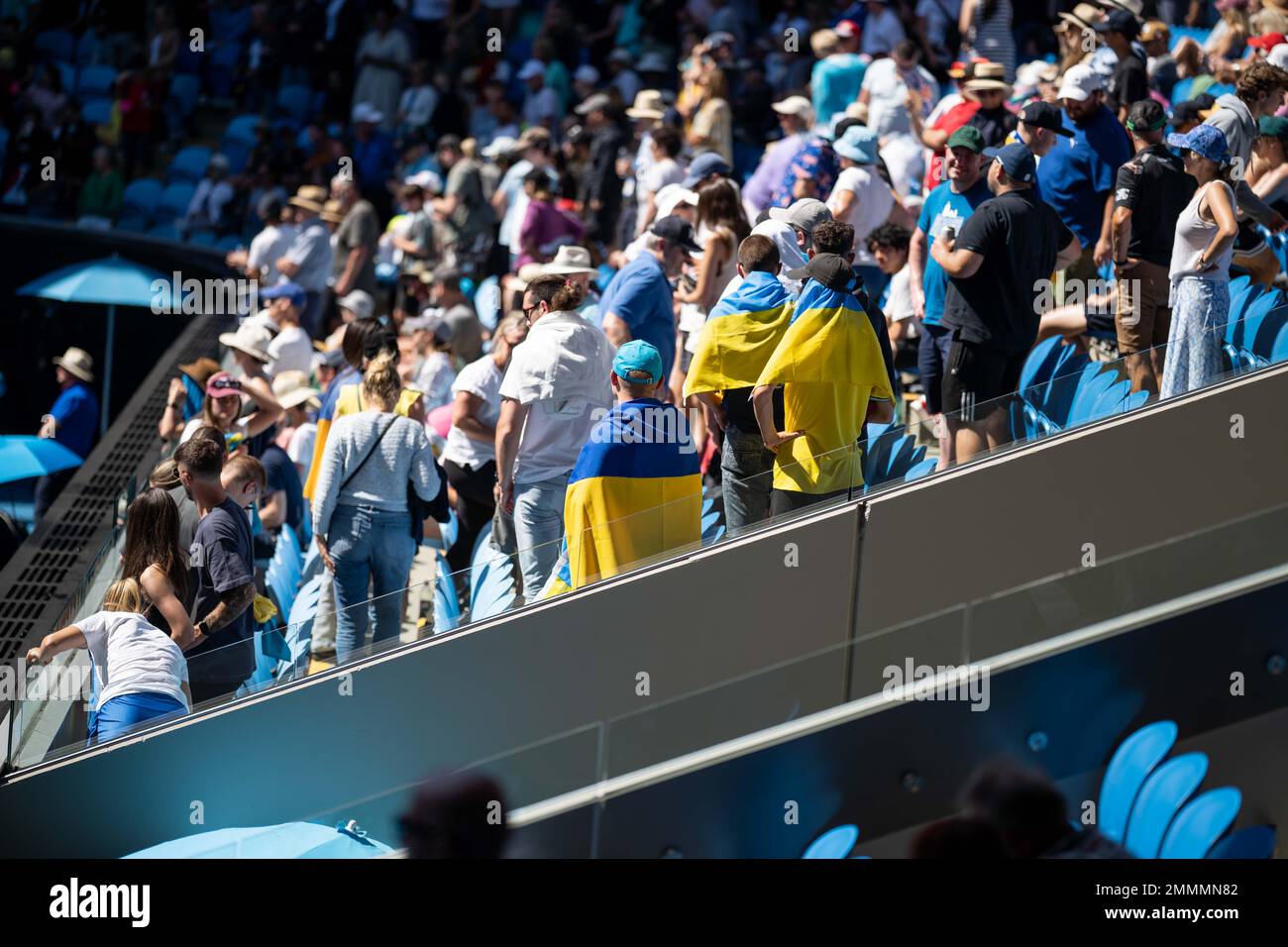 crowds watching a female Professional athlete Tennis player playing on ...