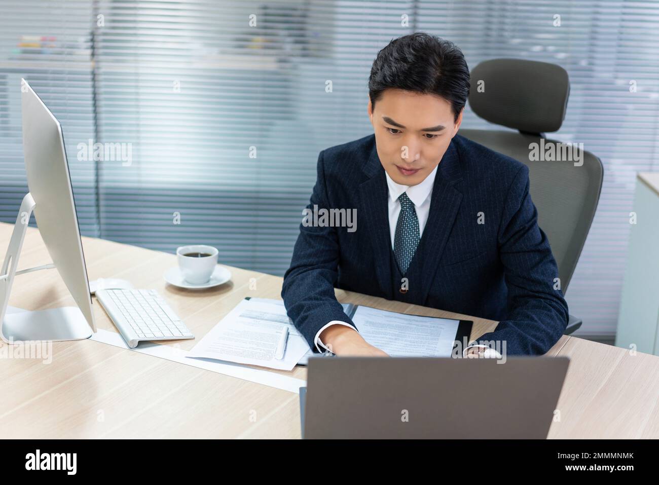 A young business man office Stock Photo - Alamy