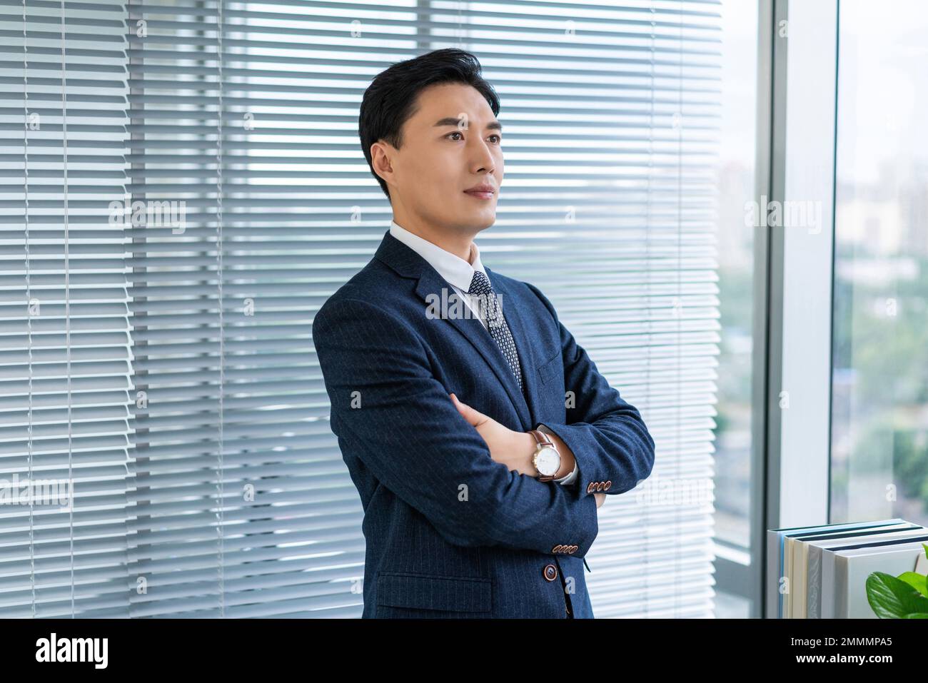 Business man suit desk arms hi-res stock photography and images - Alamy