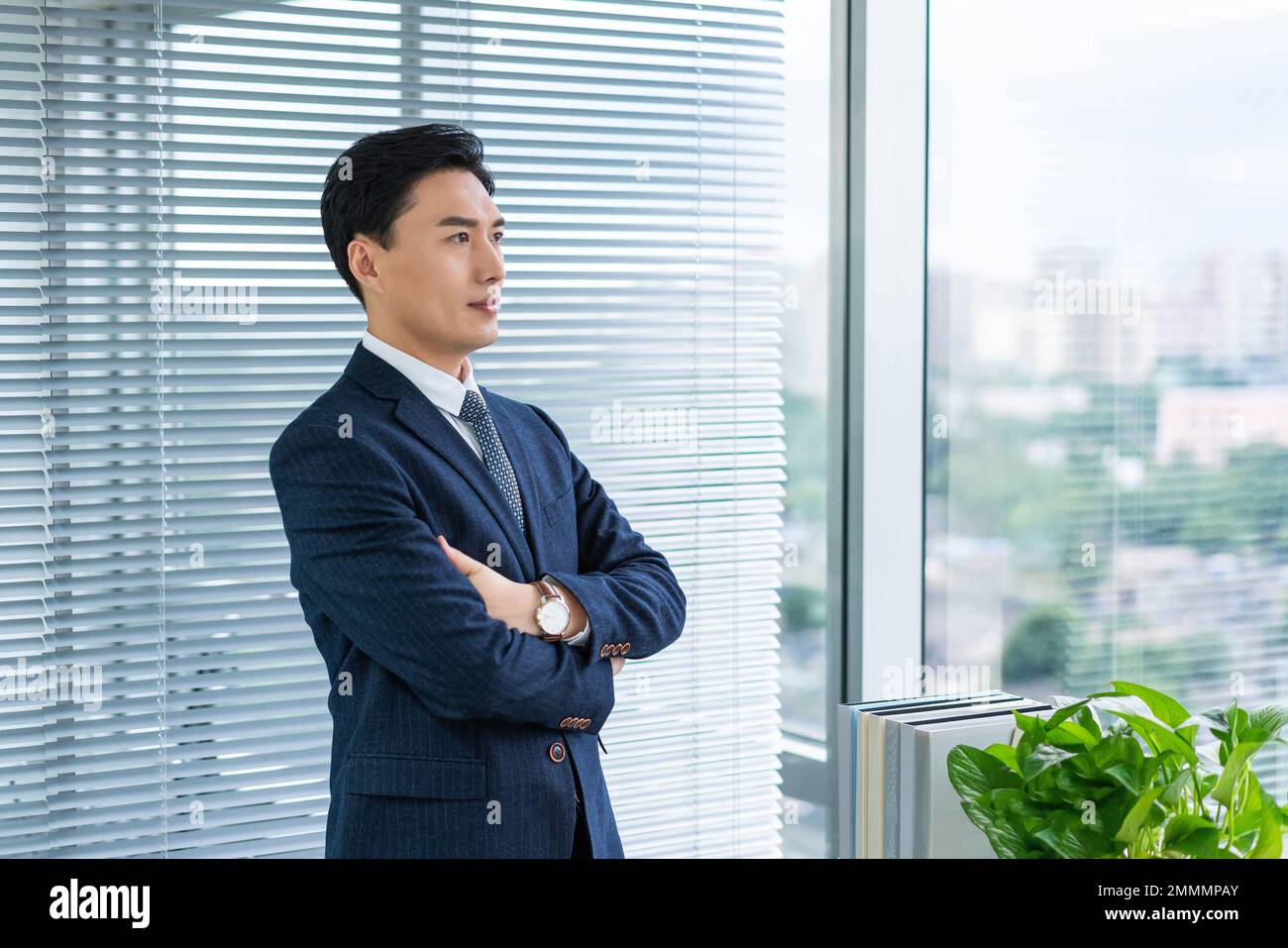 Business man suit desk arms hi-res stock photography and images - Alamy