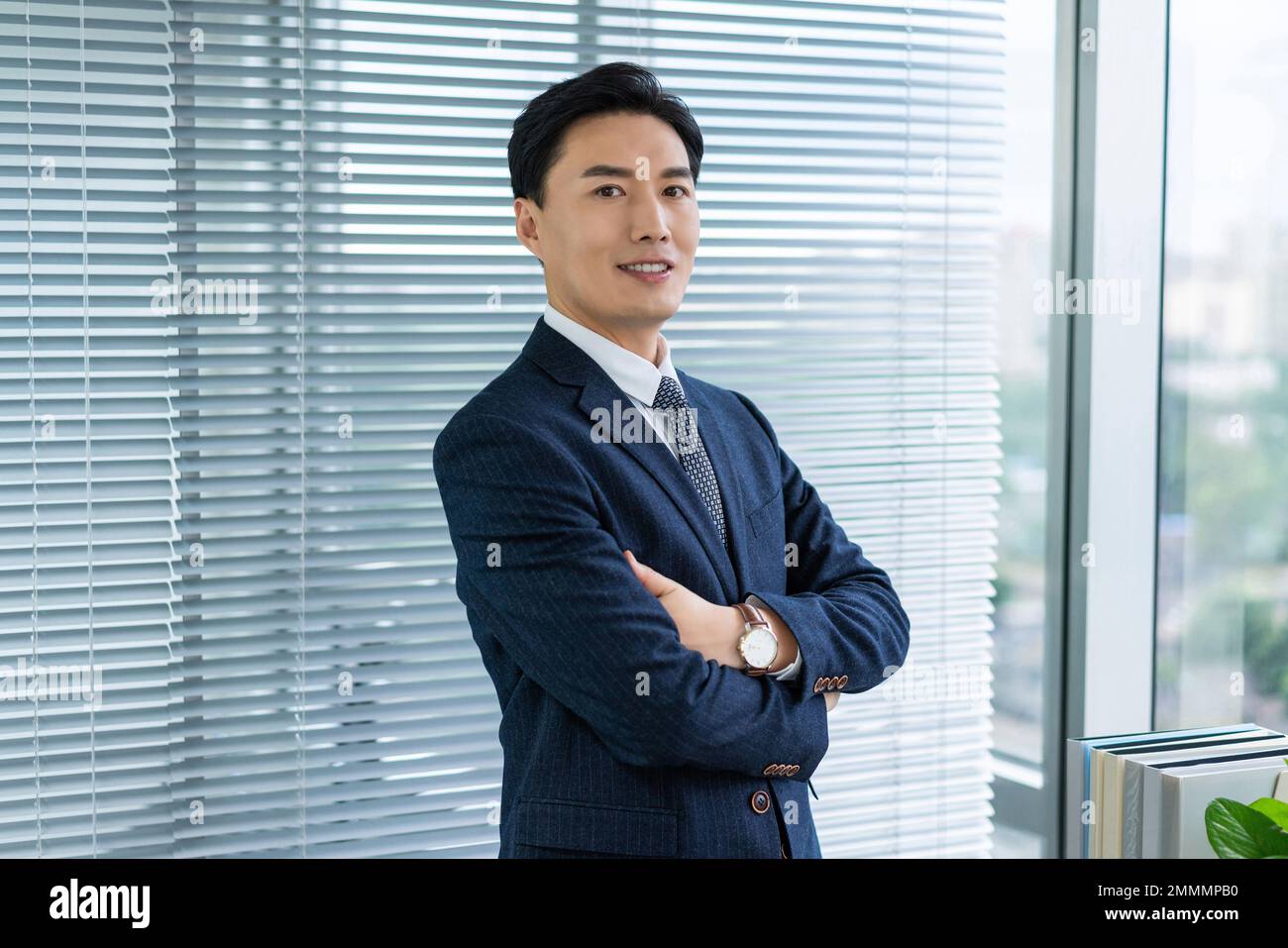 Business man suit desk arms hi-res stock photography and images - Alamy