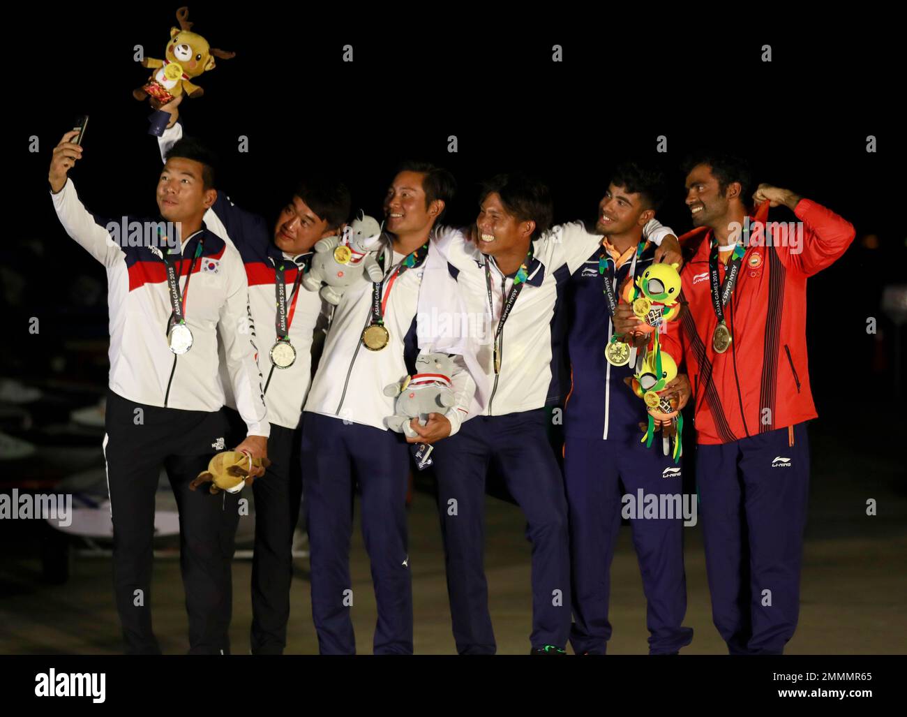 From left to right silver medalist Chae Bonjin and Kim Dongwook of ...