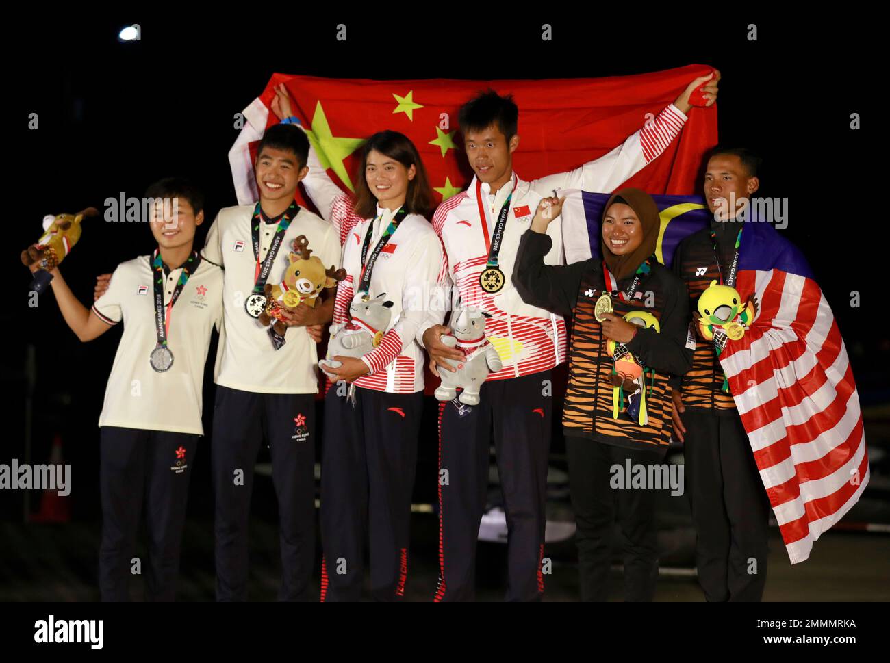 From left to right silver medalist Ma Kwan Ching and Rafeek Kikabhoy of ...