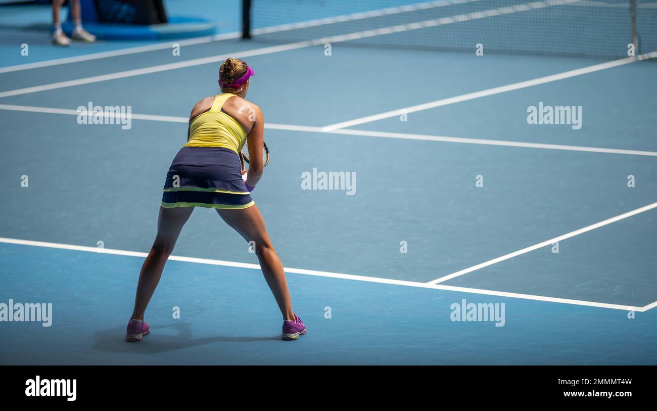 Beautiful female athlete playing tennis. Amateur female tennis player ...