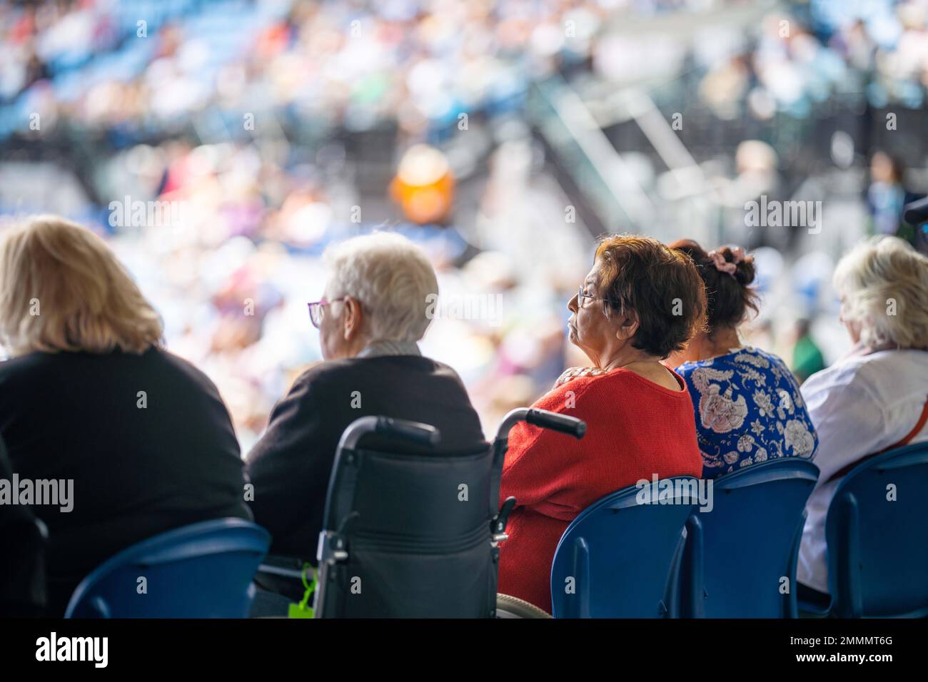 elderly tennis fan watching a a tennis match in a wheelchair at the ...