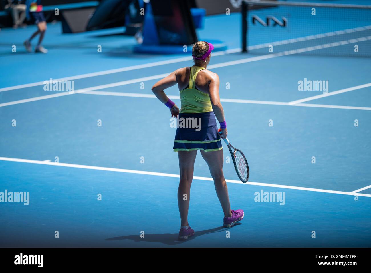 Beautiful female athlete playing tennis. Amateur female tennis player ...