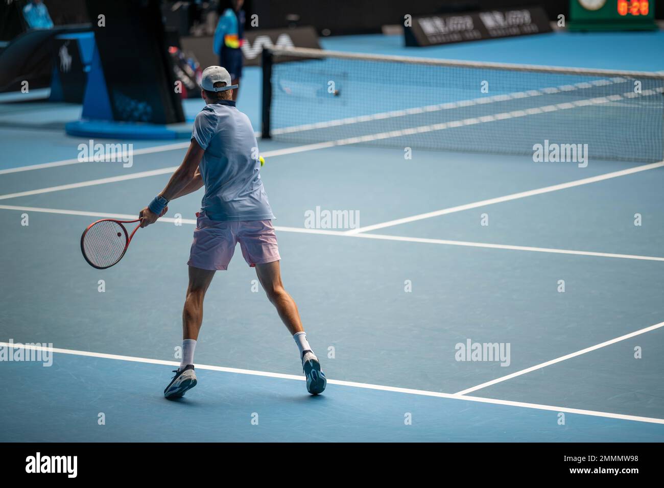 Professional athlete playing tennis on a sports court in europe Stock ...