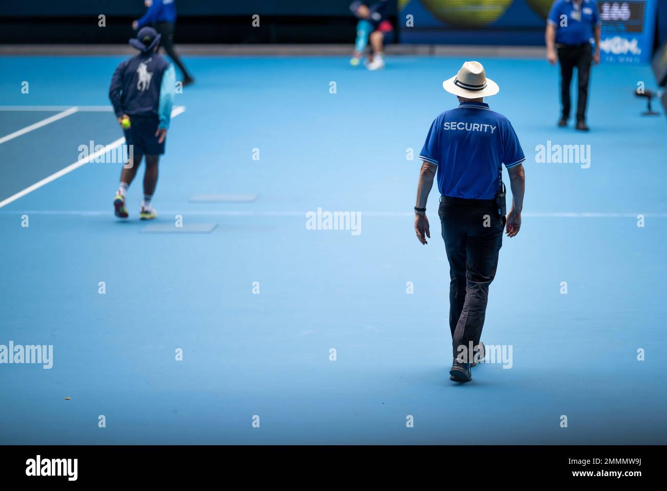 public event with security guards on court at the tennis in melbourne ...