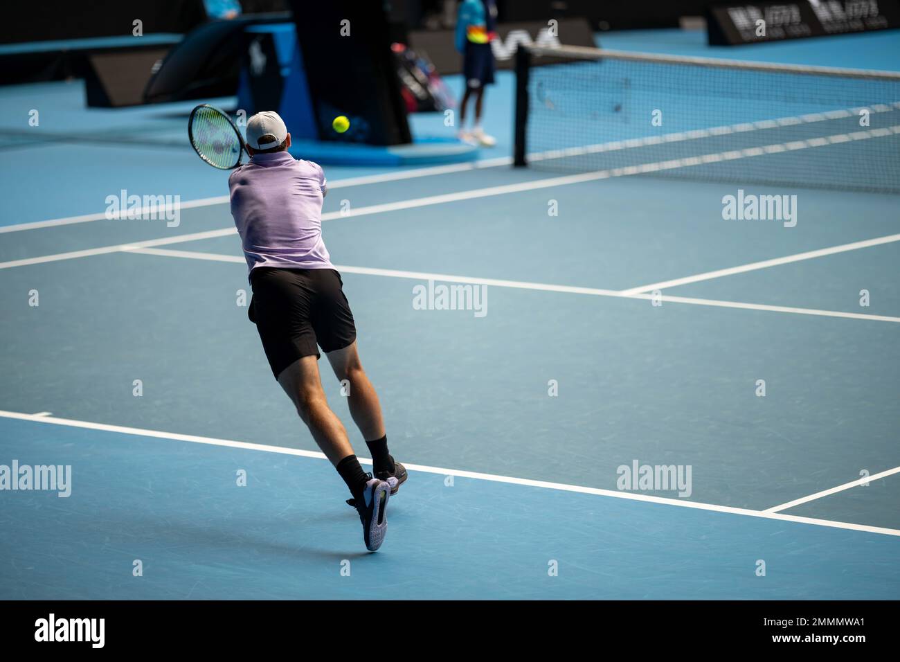 Professional athlete playing tennis on a sports court in europe Stock ...