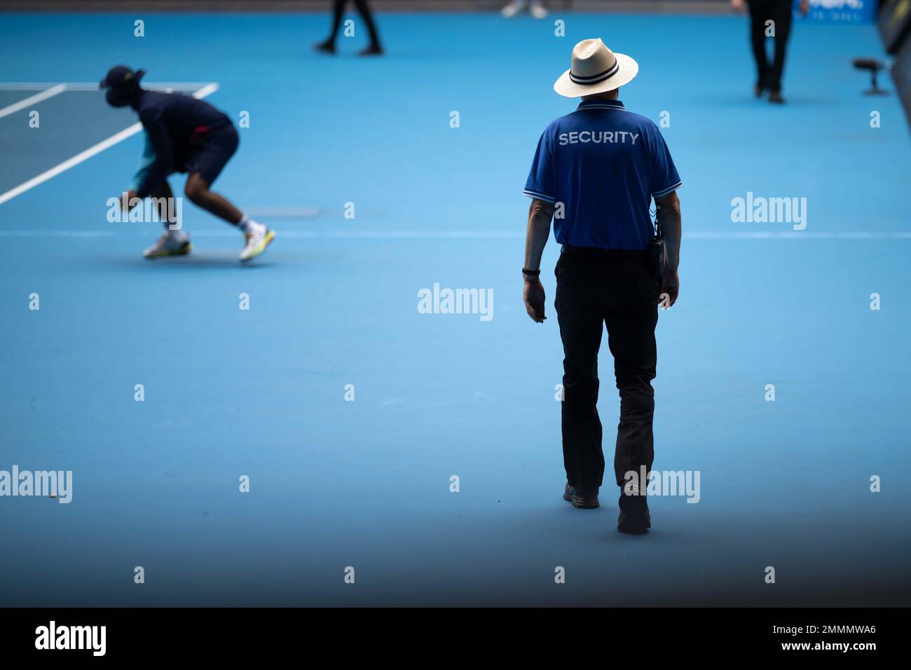 public event with security guards on court at the tennis in melbourne ...