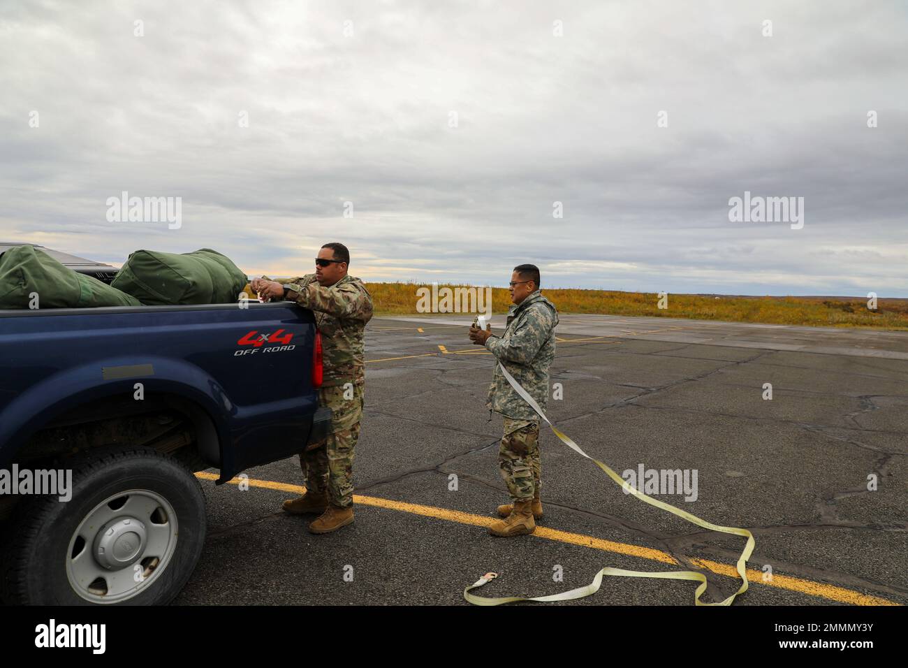 Alaska Army National Guard Staff Sgt. Mr. James Detwiler, left, a ...