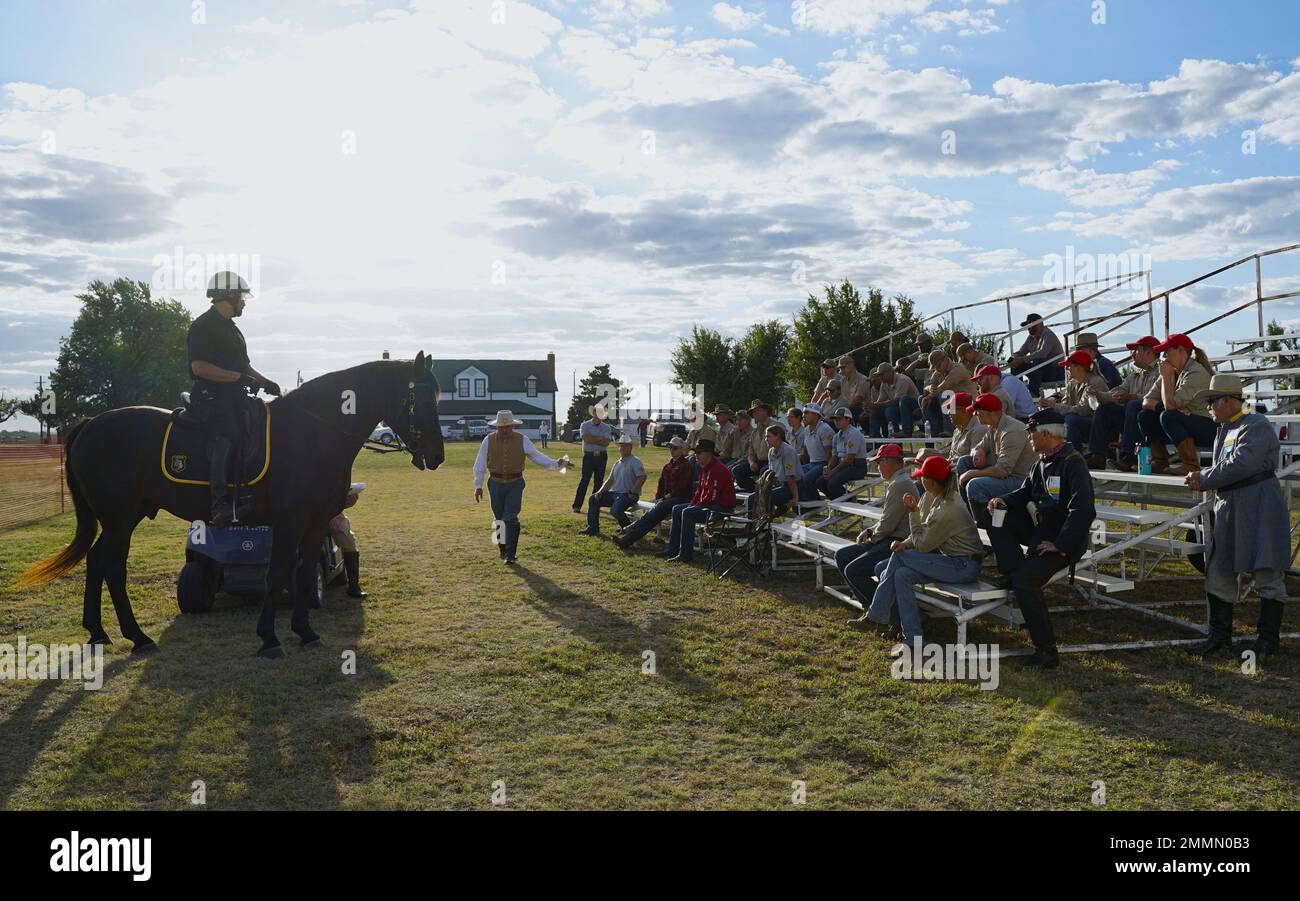 The Fort Carson Mountain Color Guard (FCMCG), attends a brief before ...