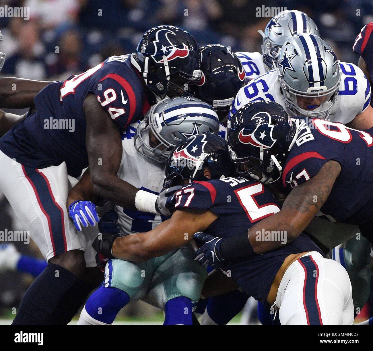Dallas Cowboys running back Darius Jackson, center, is stopped by ...