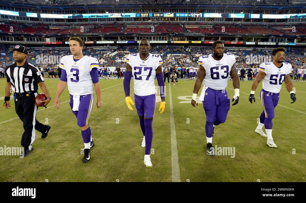 Minnesota Vikings players walk onto the field for the coin toss before ...