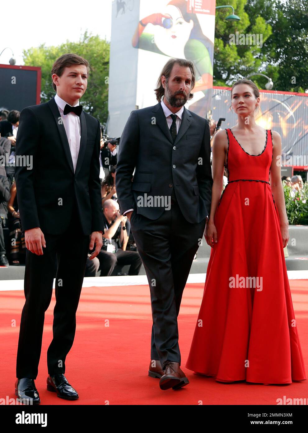 Director Rick Alverson, centre, stands with actors Tye Sheridan, left ...
