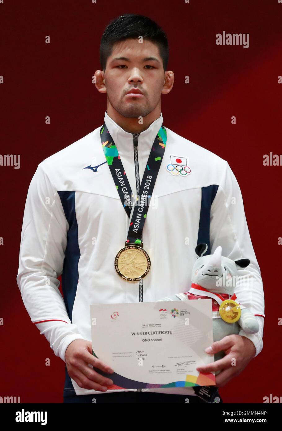 Shohei Ono of Japan with medals as he poses for photographers during ...