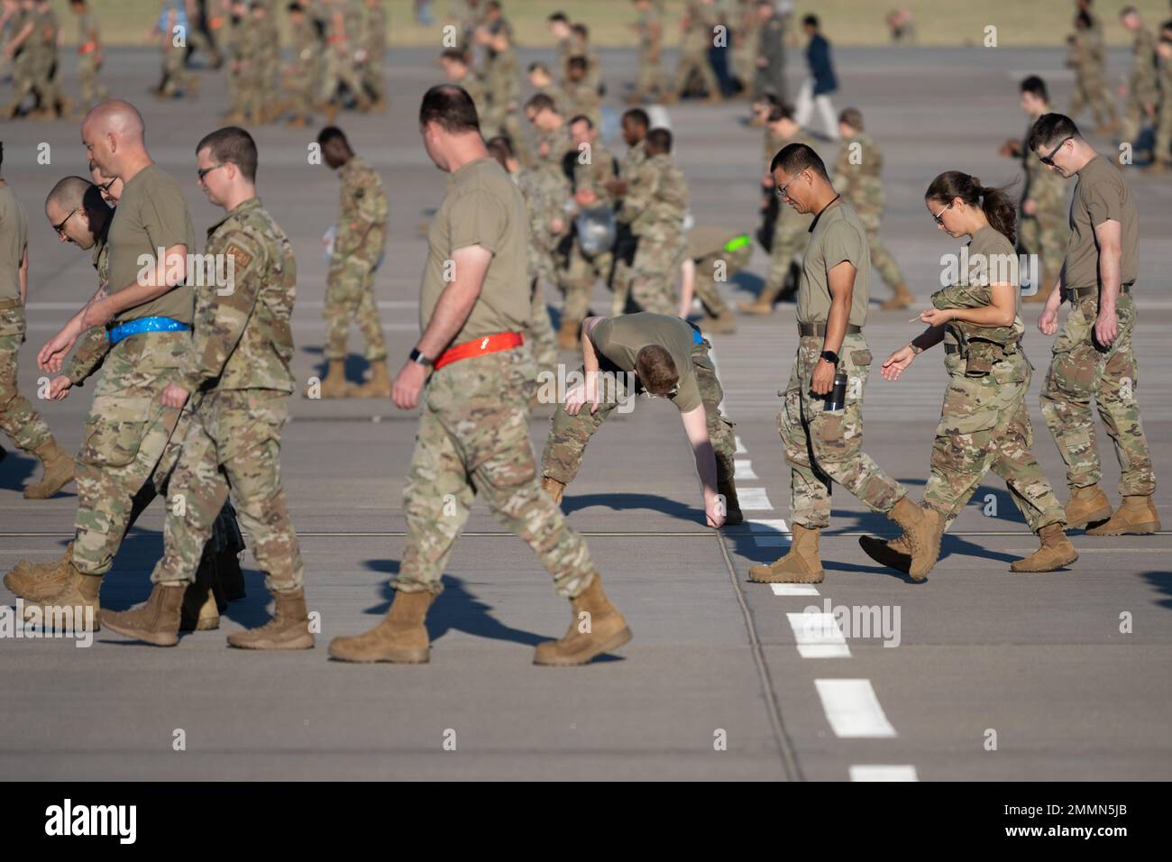 Airmen from McConnell Air Force Base, Kansas, perform a FOD (Foreign ...