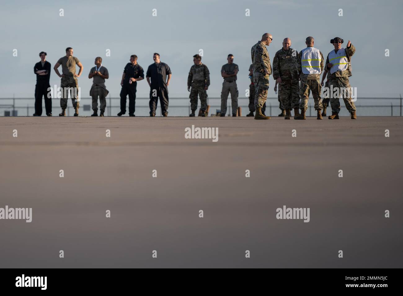 Airmen from McConnell Air Force Base, Kansas, perform a FOD (Foreign ...