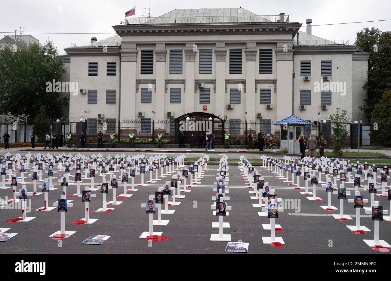 Hundreds of crosses are placed in front of the Russian Embassy in Kiev ...