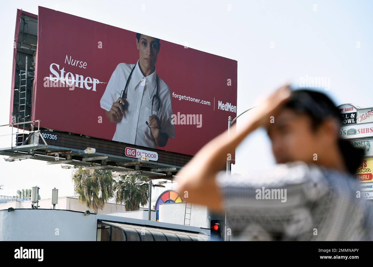 This May 9, 2018 photo shows a billboard for MedMen, a marijuana ...