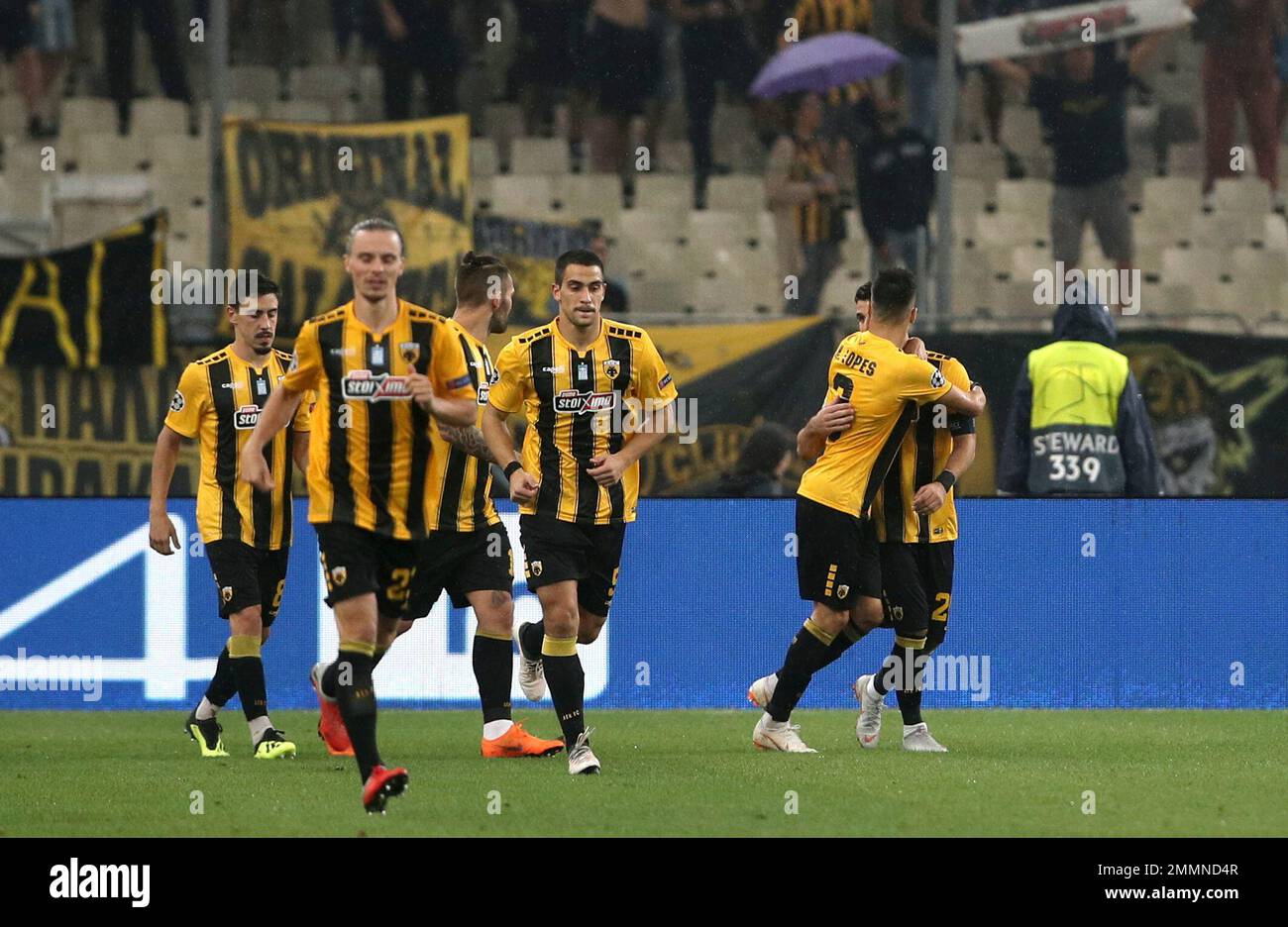 AEK's Petros Mantalos, right, celebrates after scoring the opening goal ...