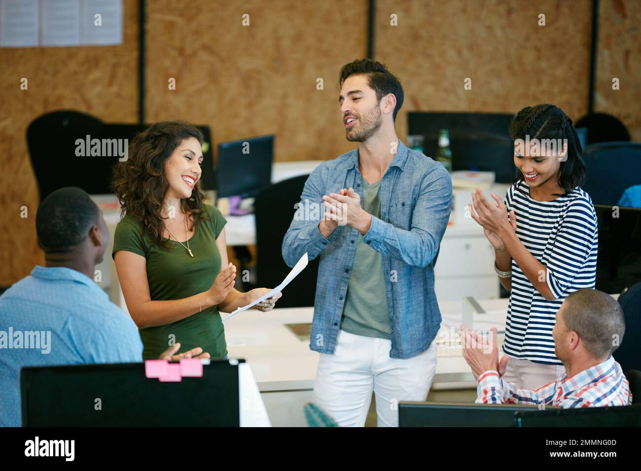 Amazing work on the project everyone. a team of colleagues having an ...