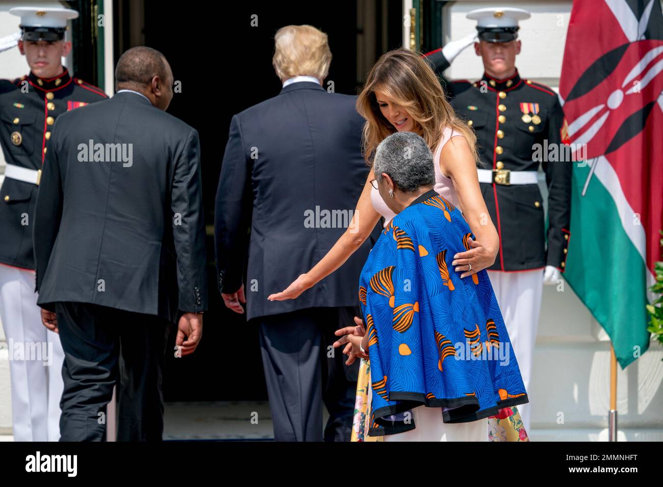 President Donald Trump and Kenyan President Uhuru Kenyatta, second from left, walk into the ...