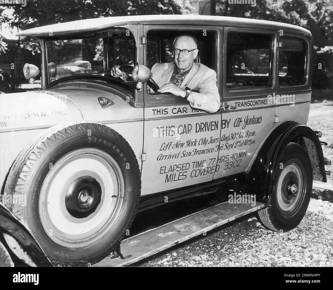 Ab Jenkins, famous speed driver, is pictured at the wheel of the record ...