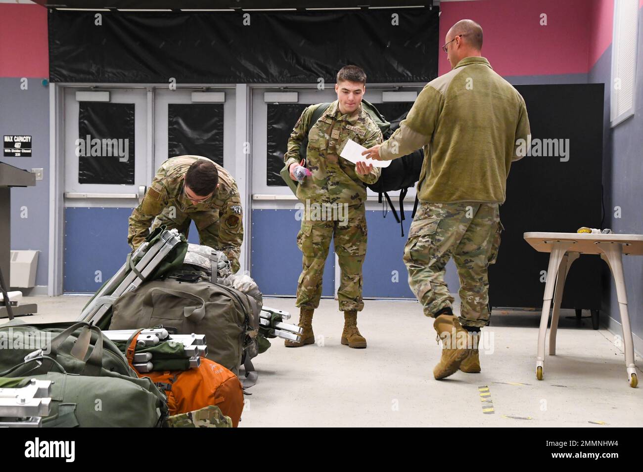 Airman Kyle Stolz of the 168th Wing, 168th Maintenance Group, left, out ...