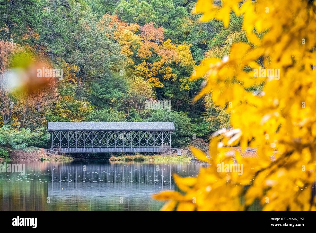 Covered bridge in autumn along the Lakemont Course at Stone Mountain ...