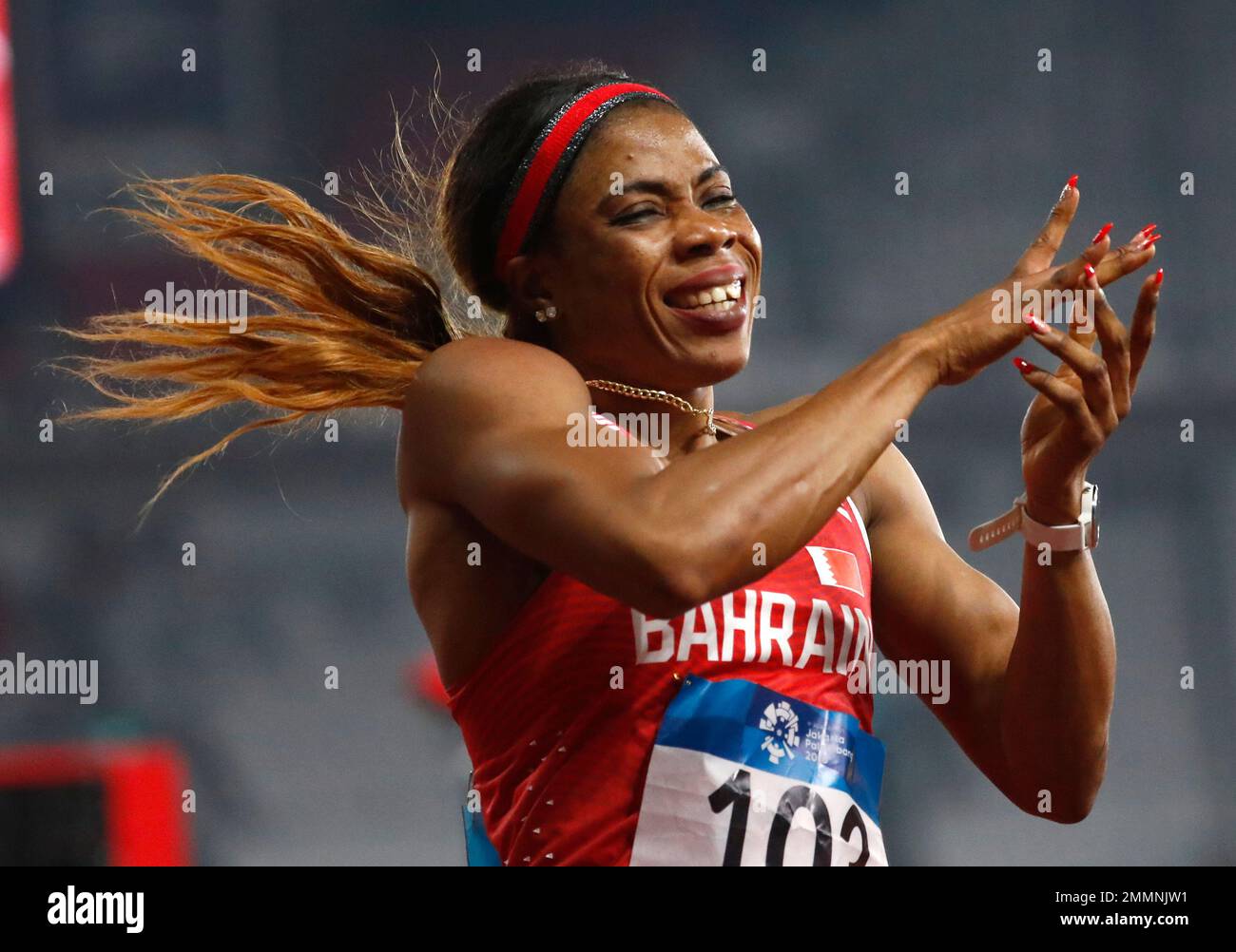 Bahrain's Oluwakemi Adekoya celebrates after crossing the finish line ...