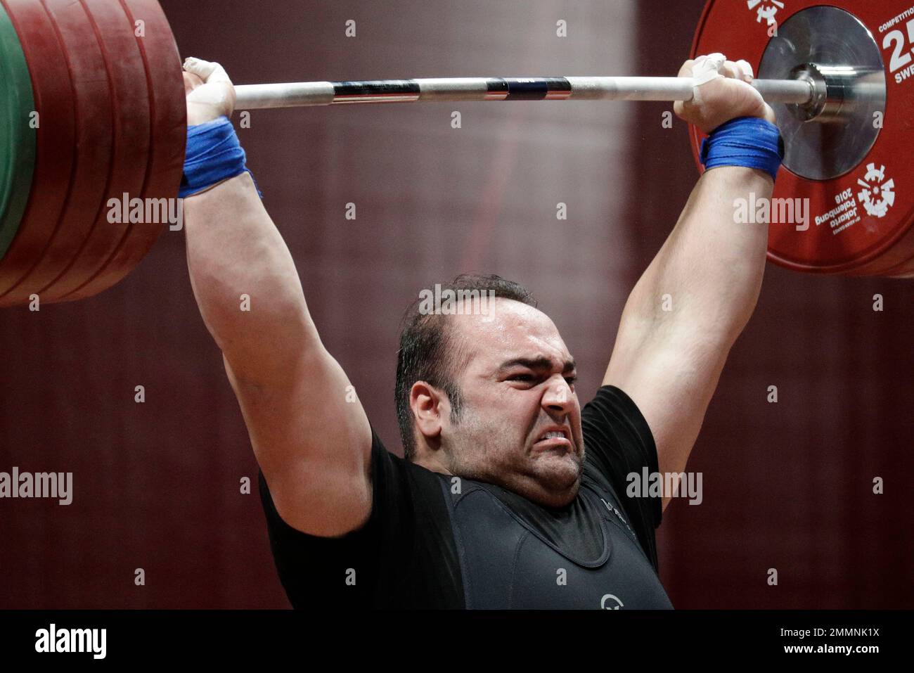 Iran's Behdad Salimikordasiabi compete at the men's +105kg ...