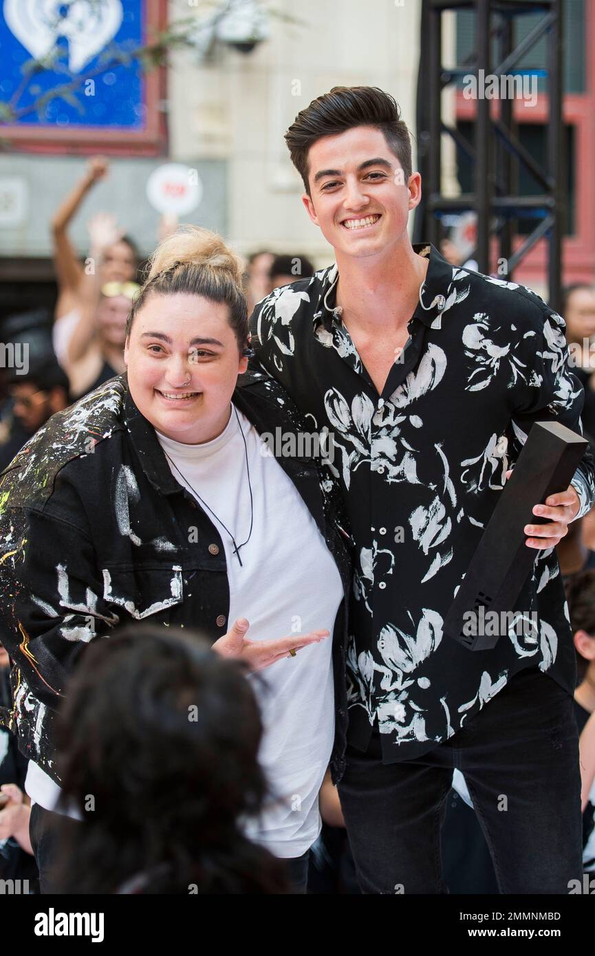 Jamie Fine, left, and Elijah Woods arrive at the 2018 iHeartRadio ...